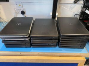 Pile of Laptops for Schools – Wightbyte Computers